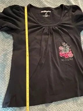 Disney | Tops | Disney Pirates Black Tee With Pink Skull Accents | Poshmark